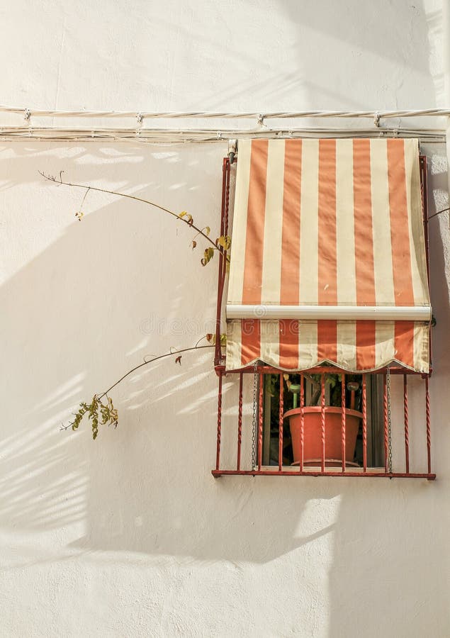 Window with White and Orange Striped Awning Stock Photo - Image of ...