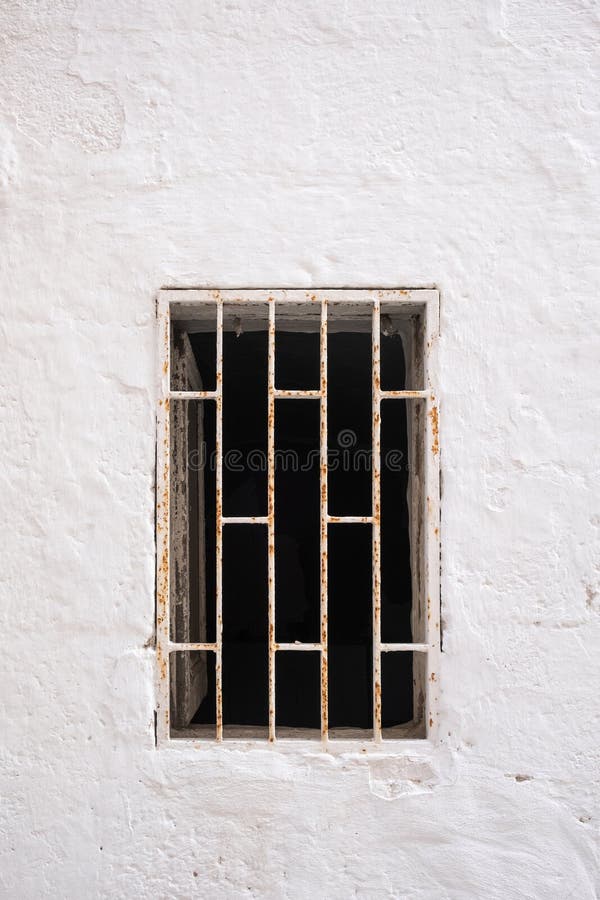 Window in a White Stone Wall, Closed by Bars Stock Photo - Image of ...