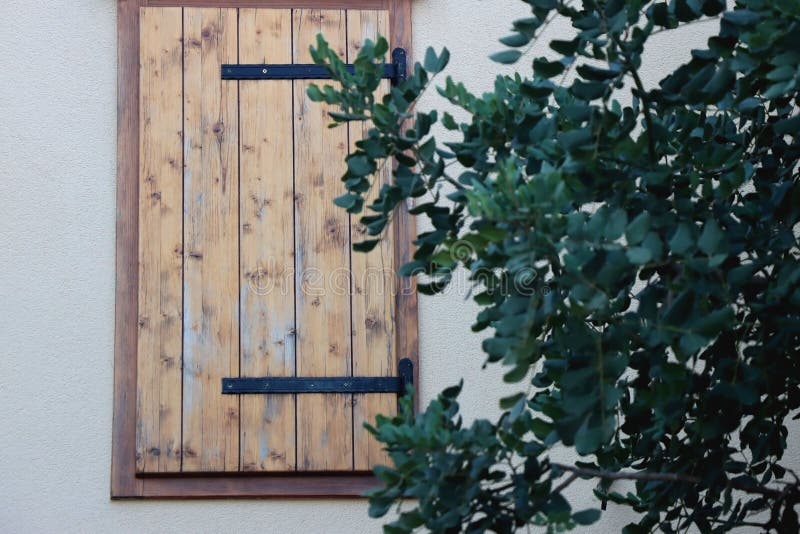Wooden Shutters and Tree Branches Stock Image - Image of countryside ...