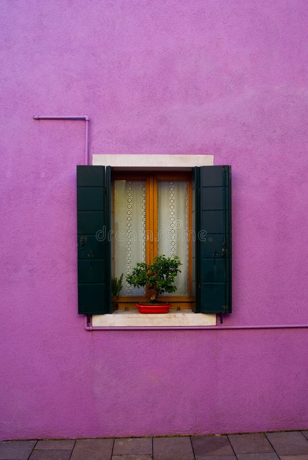 Window in a purple wall stock image. Image of decoration - 30315585