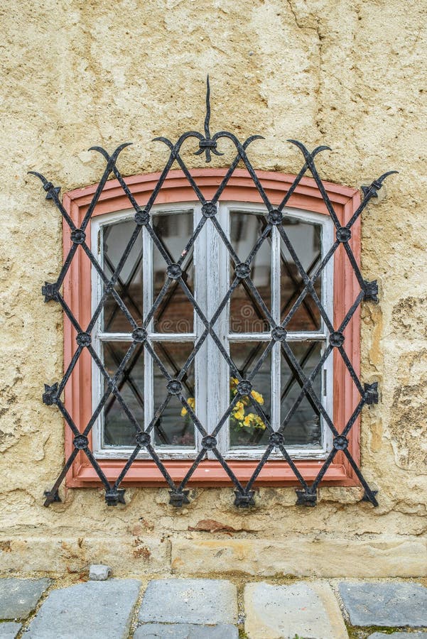 Window with Wrought Iron Bars Stock Image - Image of cast, house: 63341889