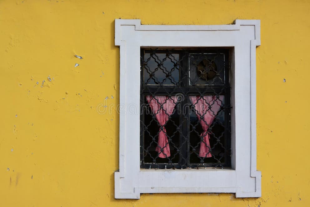 Window on yellow wall stock photo. Image of building - 68674740