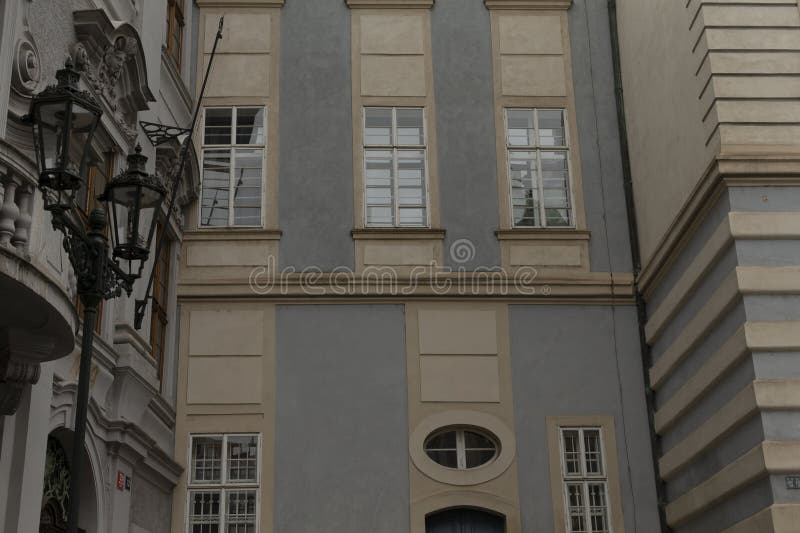 A Windowed Building is Surrounded by Other Buildings Stock Photo ...