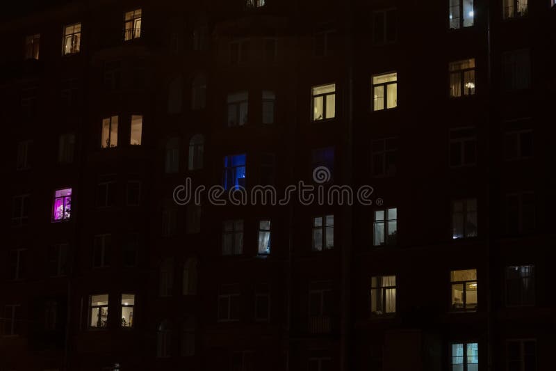 Windows of an Apartment Building at Night Stock Photo - Image of ...