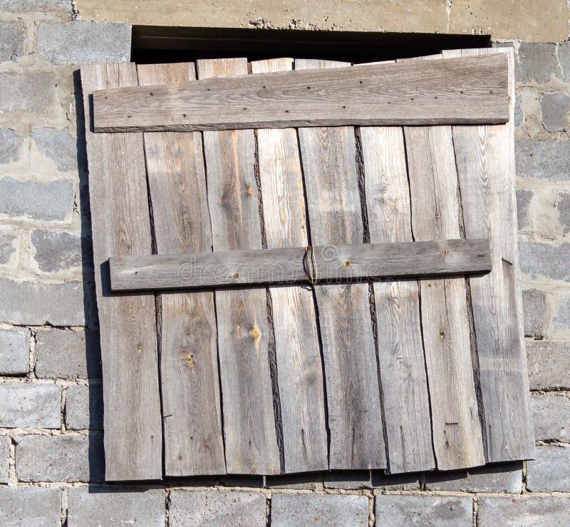 The Windows of a Brick House Boarded Up with Wooden Boards Stock Image ...