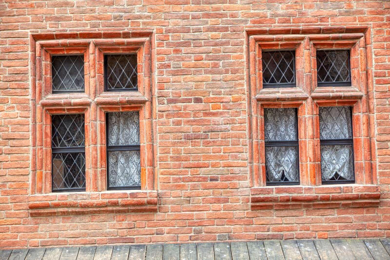 Windows and bricks wall stock image. Image of house - 177329807