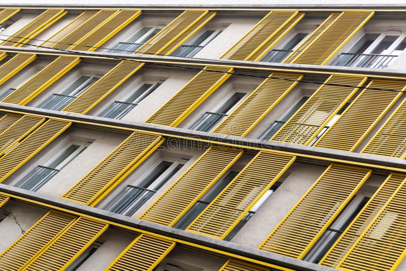 Windows of a Building with Yellow Shutters in the Old Center of ...