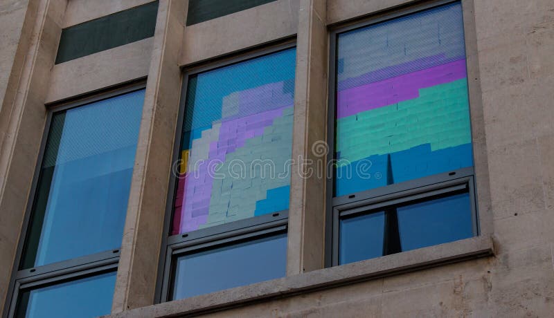 Windows Covered in Sticky Coloured Paper Stock Image - Image of people ...