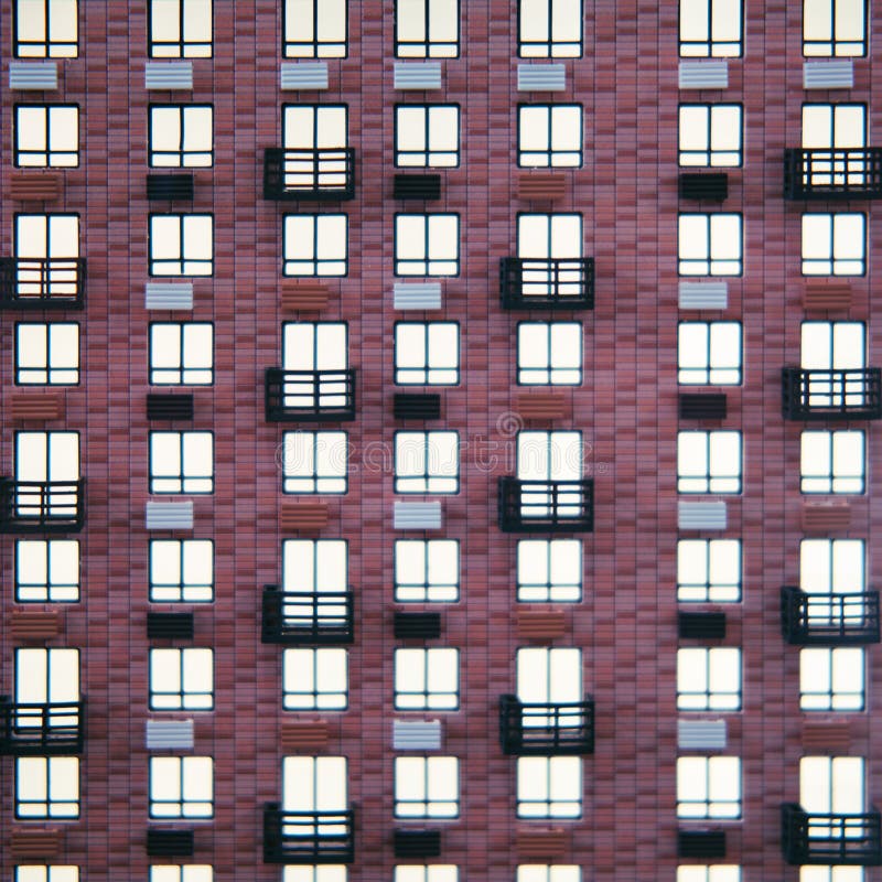 Windows on the Facade of the Brown Building, Background. Close-up ...