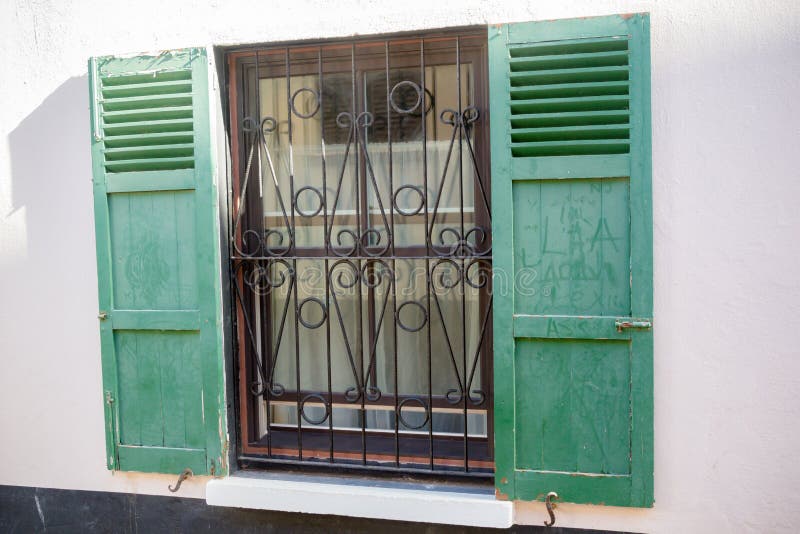 Windows in Gibraltar stock photo. Image of shutters - 129409776