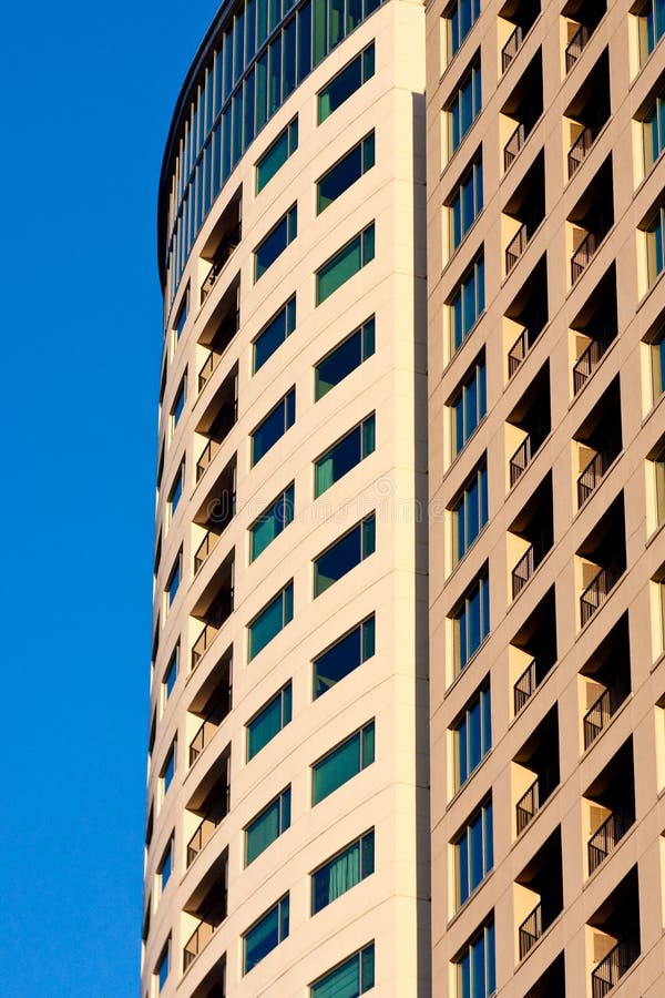Windows in a High Rise Condo Building on Blue Stock Photo - Image of ...