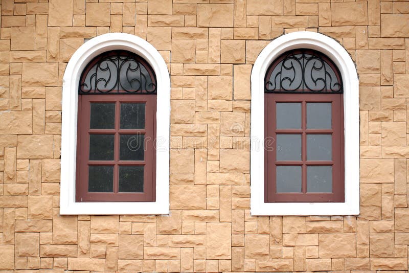 Windows of Homes with Brick Wall Surround. Stock Image - Image of color ...