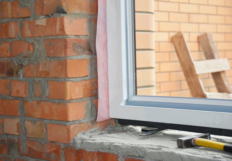 Windows Installation. Inserting a Upvc Plastic Window Frame in a Newly ...