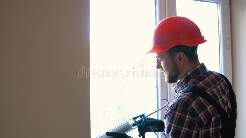 Windows Installation Worker Use of Foam when Installing Windows Stock ...