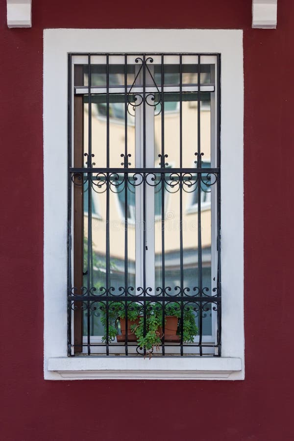 Windows with iron bars stock photo. Image of mediterranean - 41334170