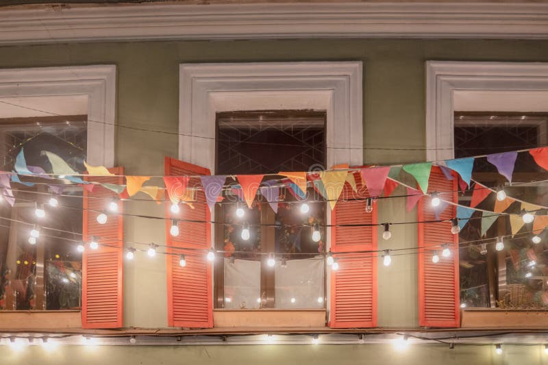 Windows with Light Bulbs and a Garland of Triangular Flags Stock Photo ...