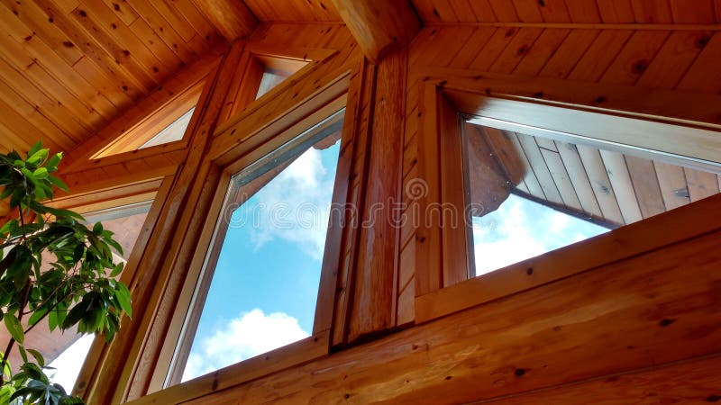Windows of a log home stock photo. Image of windows - 238549226