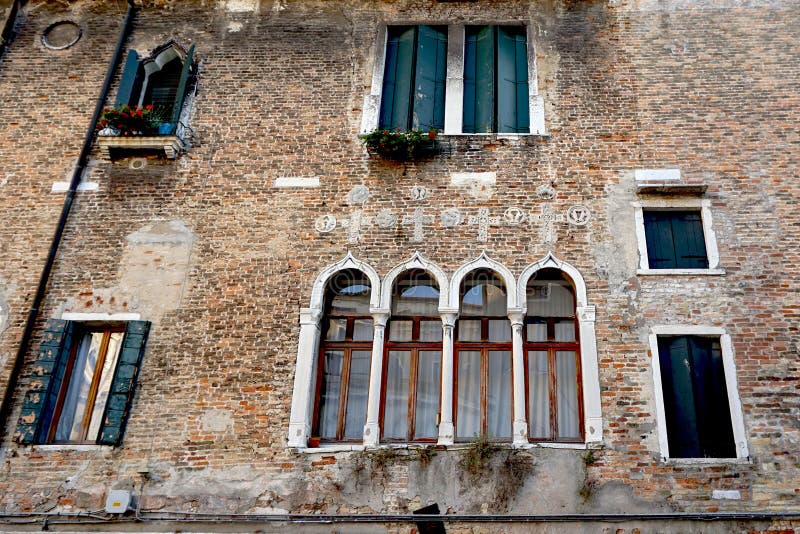 Windows Mixed on Brick Wall Building Stock Photo - Image of door, italy ...