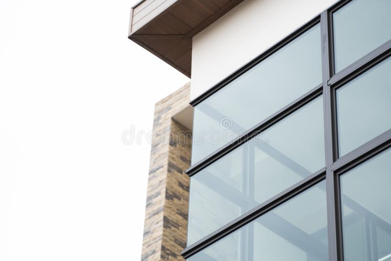 Windows of Modern Apartment Buildings Exteriors in Cloudy Day. Stock ...