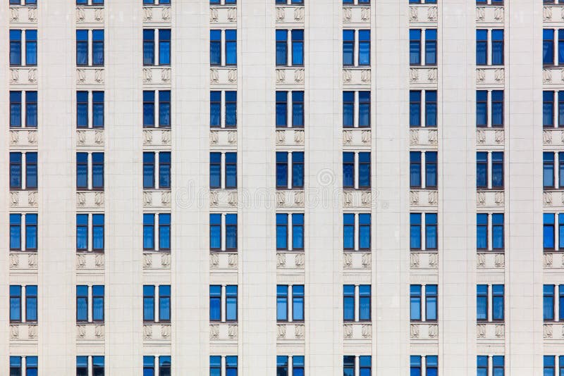 Windows on a Multi-storey Building As a Background Stock Image - Image ...