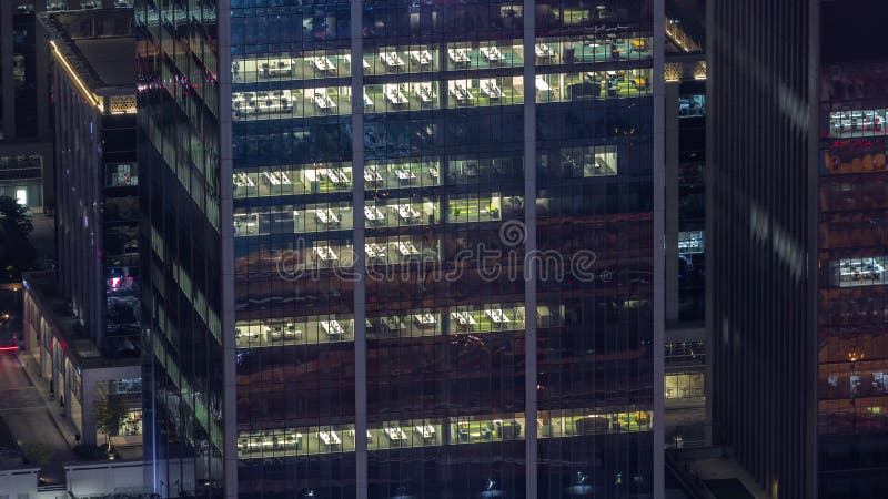 Windows in Offices of a High Class Building at Night Timelapse Stock ...