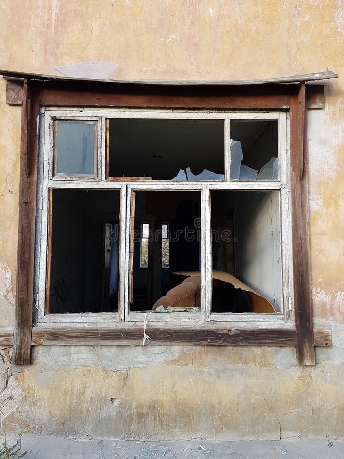 The Windows of an Old Abandoned House with Broken Glass. the Concept of ...