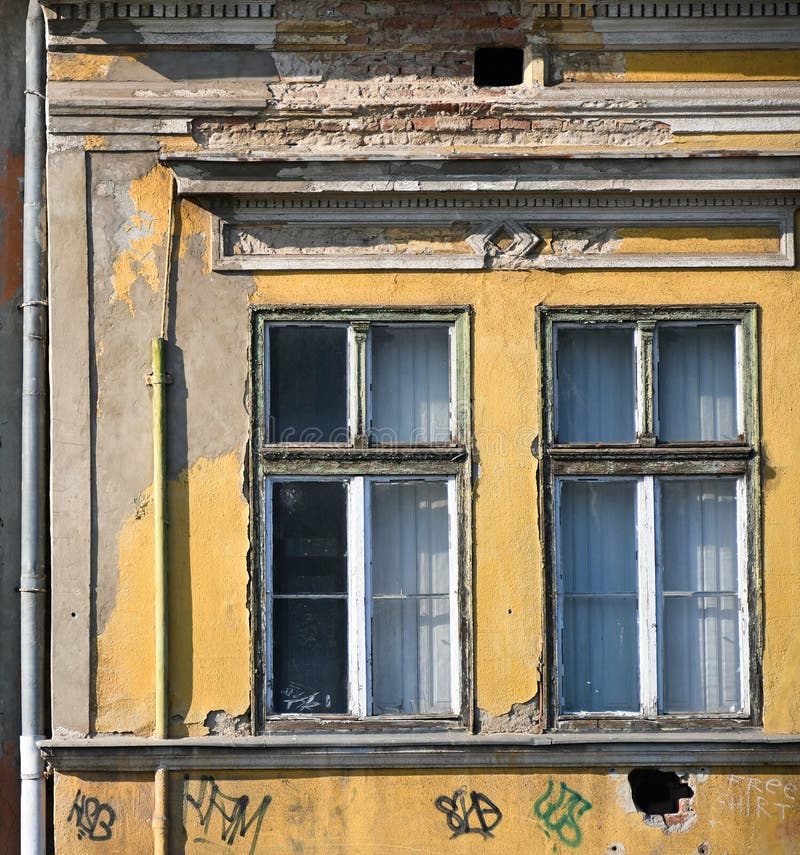 Windows of an Old Building in the City Stock Photo - Image of eaves ...