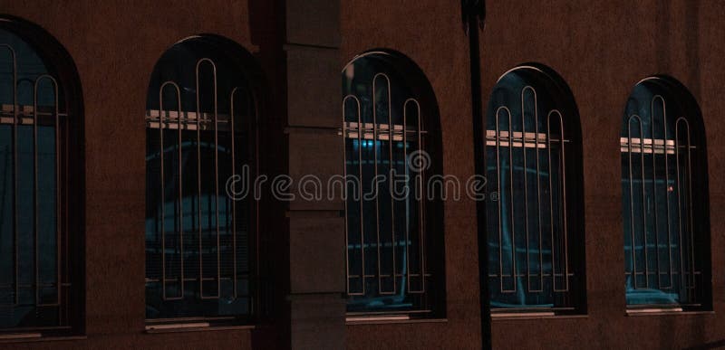 Windows of an Old Building at Night. Stock Photo - Image of dark ...