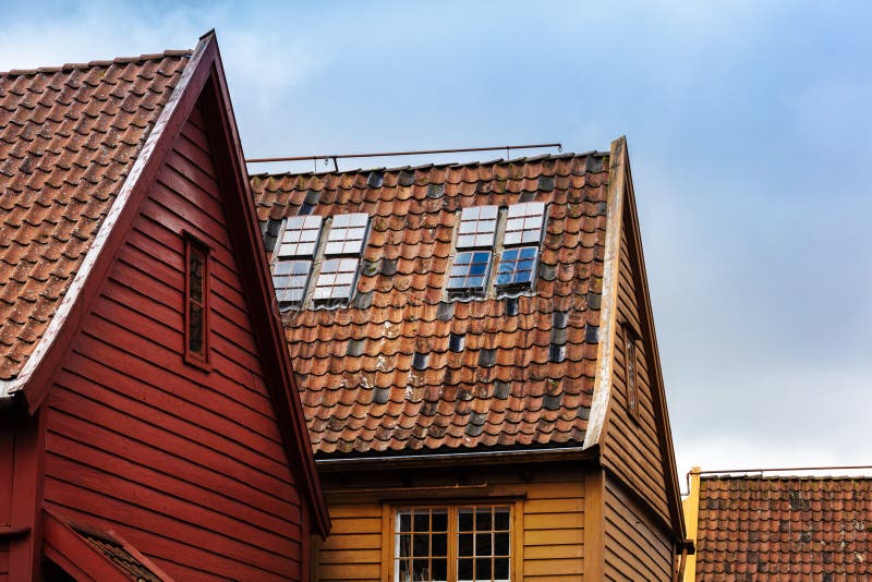 Windows on old tile roof stock photo. Image of roofing - 242602862