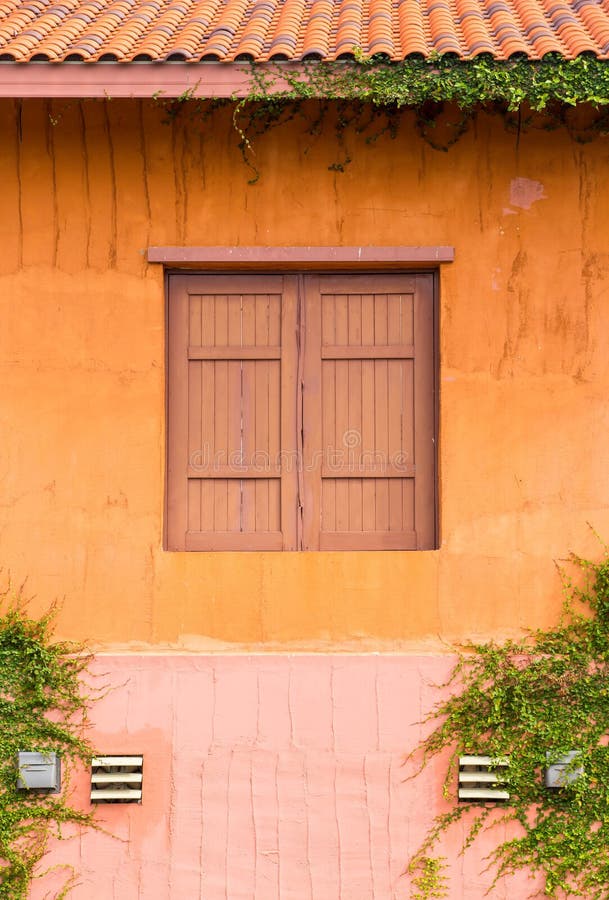 Windows with orange walls stock photo. Image of home - 96002542