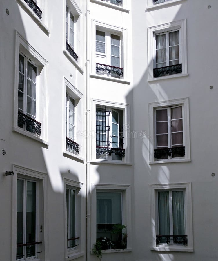 Windows in Paris stock photo. Image of courtyard, windows - 117912862