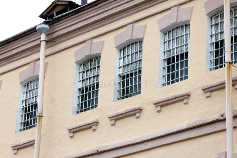 Windows of a Prison Building with Bars Stock Photo - Image of ...