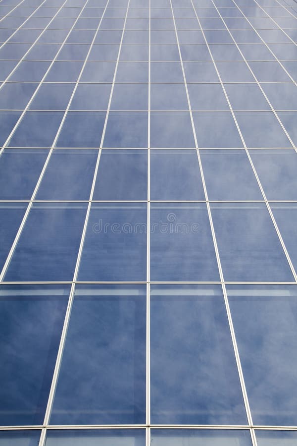 Windows with Reflections of Clouds Stock Image - Image of surface, form ...