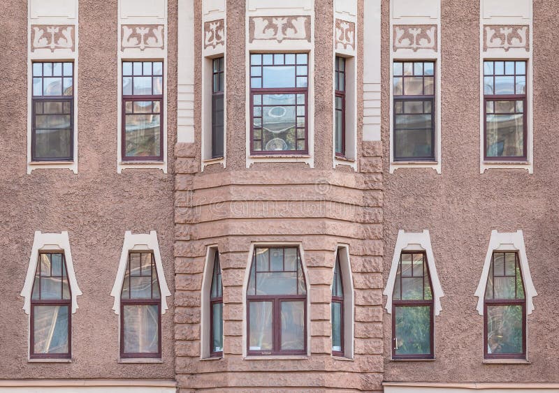 Windows in a Row and Bay Window on Facade of Apartment Building Stock ...