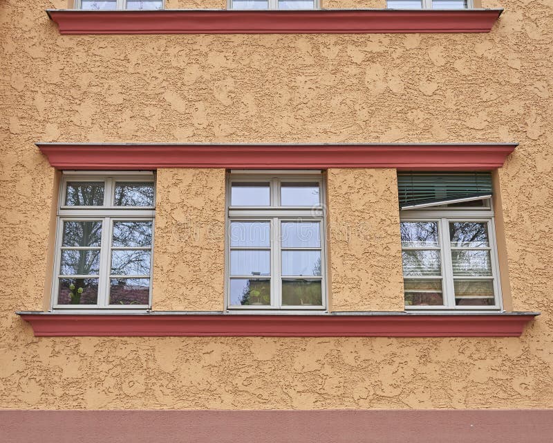 Windows Row on Colorful House Wall Stock Image - Image of decorative ...