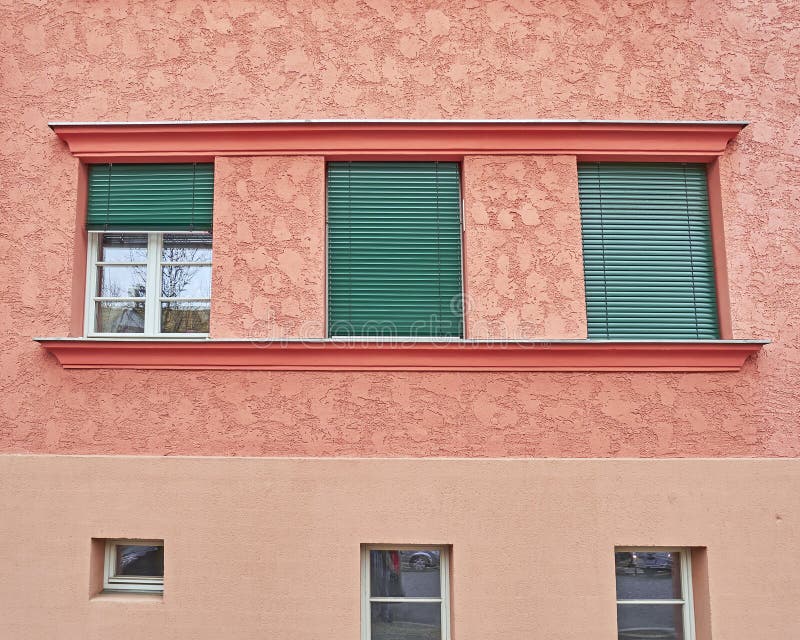 Windows Row on Colorful House Wall Stock Photo - Image of wall ...