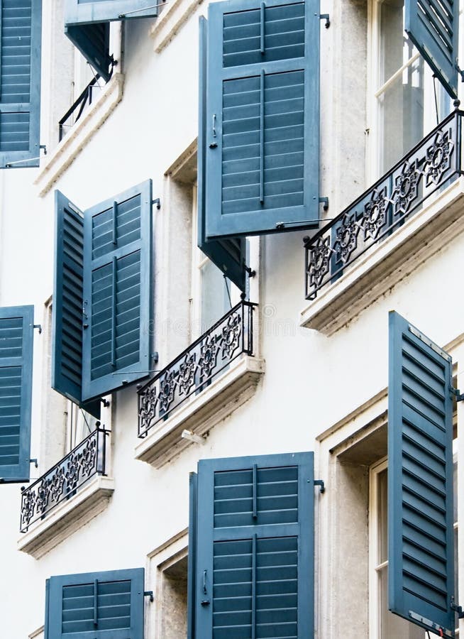 Windows with Shutters and Forged Rails Stock Photo - Image of clear ...