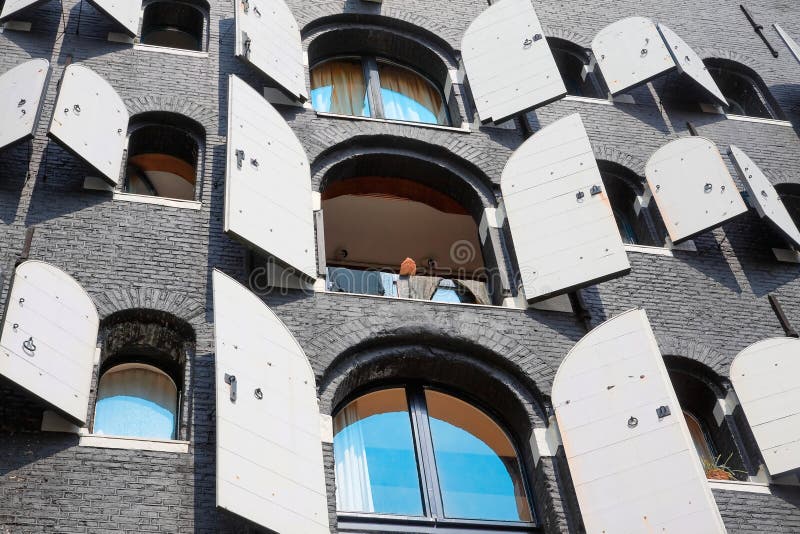 Windows and Shutters with Leg One S Inhabitant Stock Photo - Image of ...