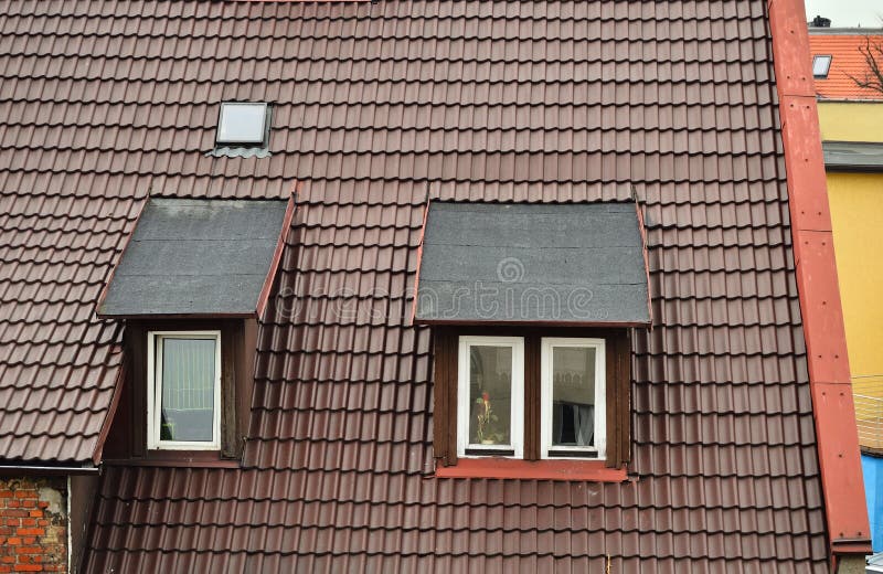 Windows in a Sloping Brown Roof. Day. Summer Stock Photo - Image of ...