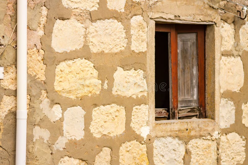 Windows on the stone wall stock photo. Image of sicily - 115287722