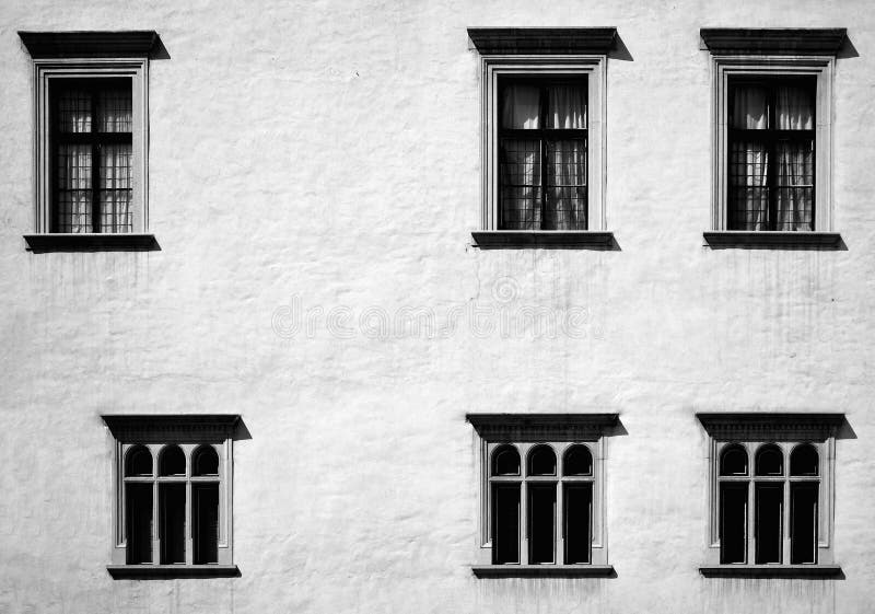 Windows in uneven rows stock photo. Image of arches, stages - 82623280