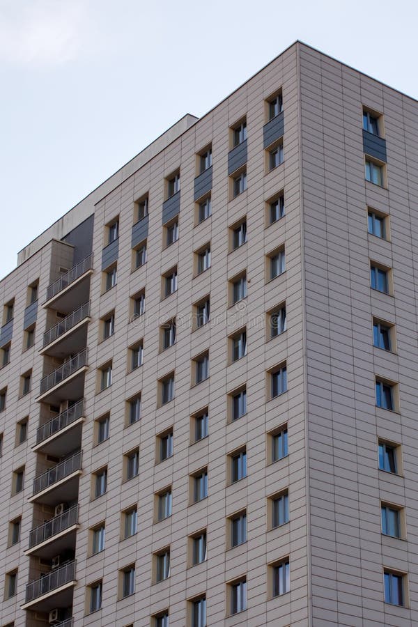 Windows of Upper Floors of High Building Stock Photo - Image of blue ...