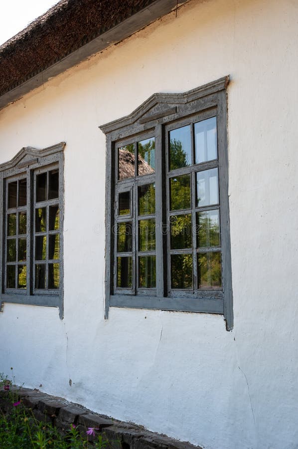 Windows in the Village House Building. Village House Architecture with ...