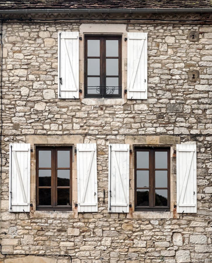 Windows in stone wall stock image. Image of building - 214829575