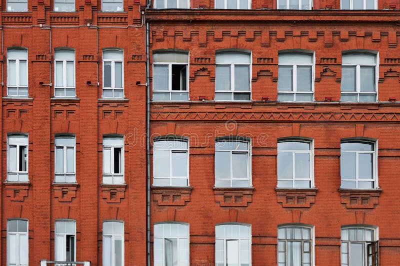 Windows with White Frame on Red Brick Wall. Exterior Front Street View ...