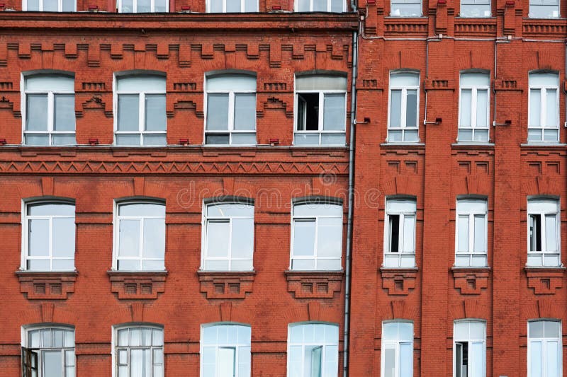 Windows with White Frame on Red Brick Wall. Exterior Front Street View ...