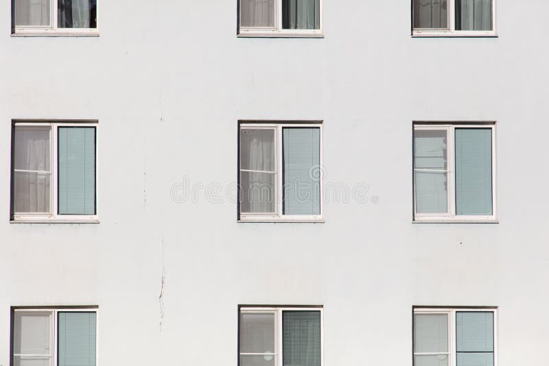 Windows in a White Multi-storey Building Stock Photo - Image of ...