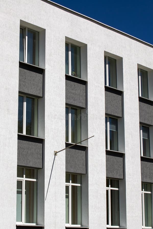 The Windows of the White Three-story Building Stock Image - Image of ...