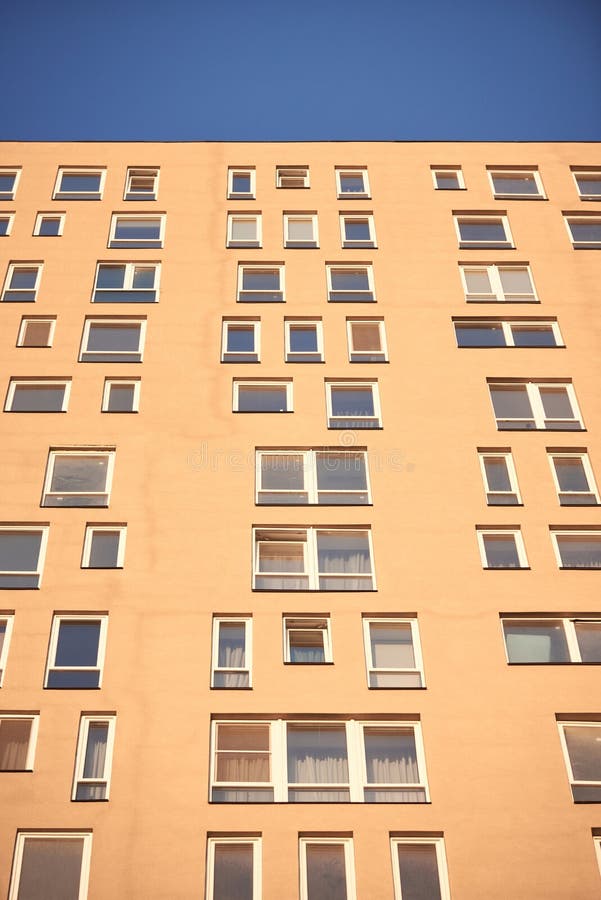Windows on Yellow Flagstone Building Facade Stock Image - Image of ...