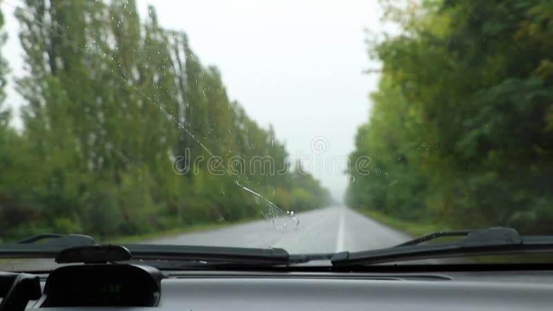 Windshield in the Car at Speed in the Rain, the View from the Passenger ...